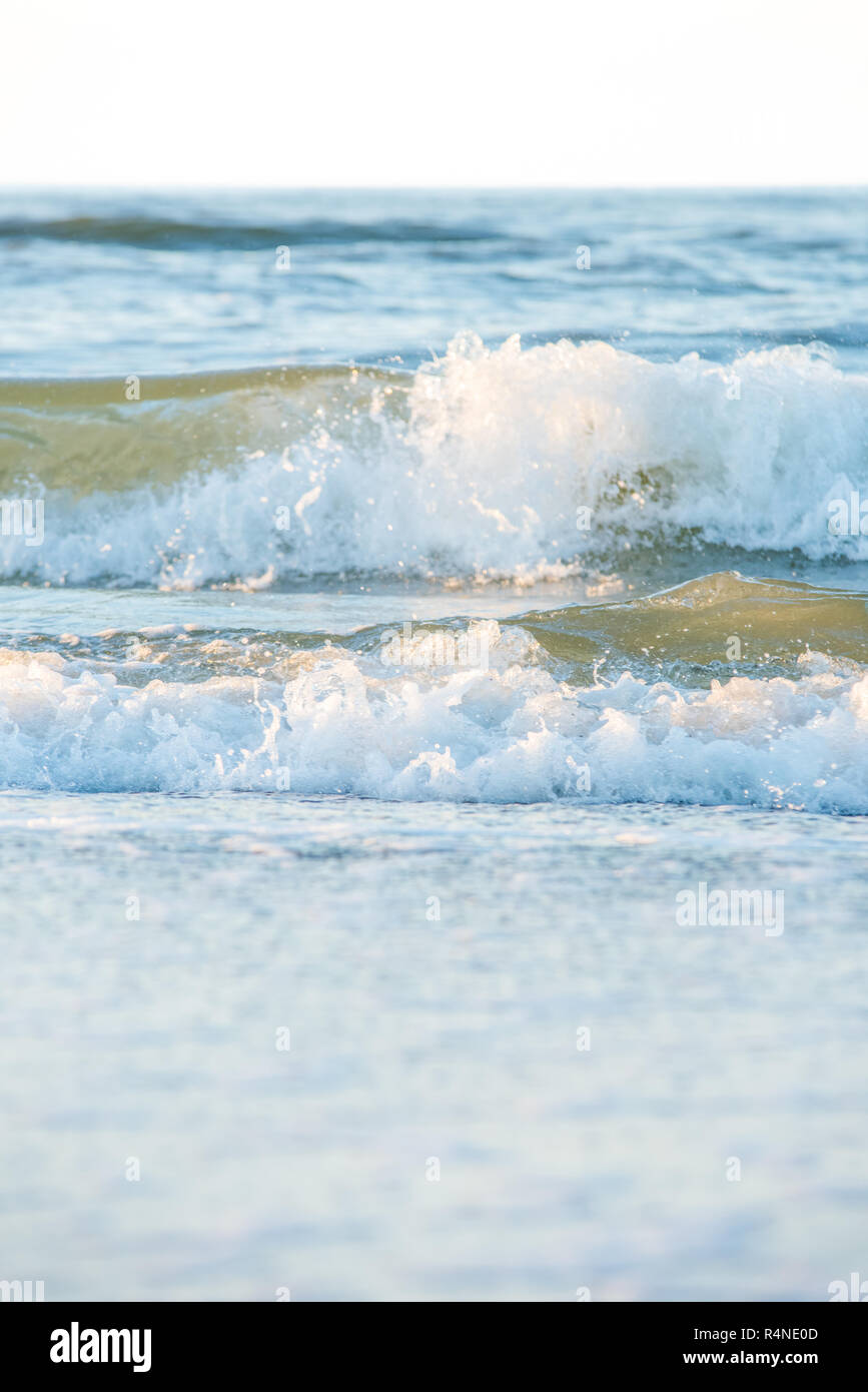Sea wave breaking Stock Photo - Alamy