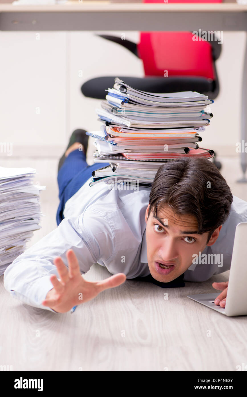 Extremely busy employee working in the office Stock Photo - Alamy