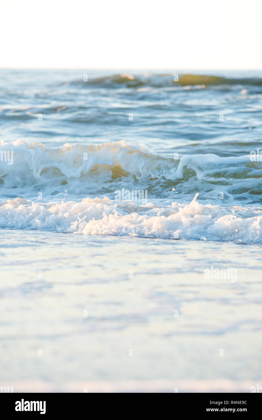 Sea wave breaking Stock Photo - Alamy