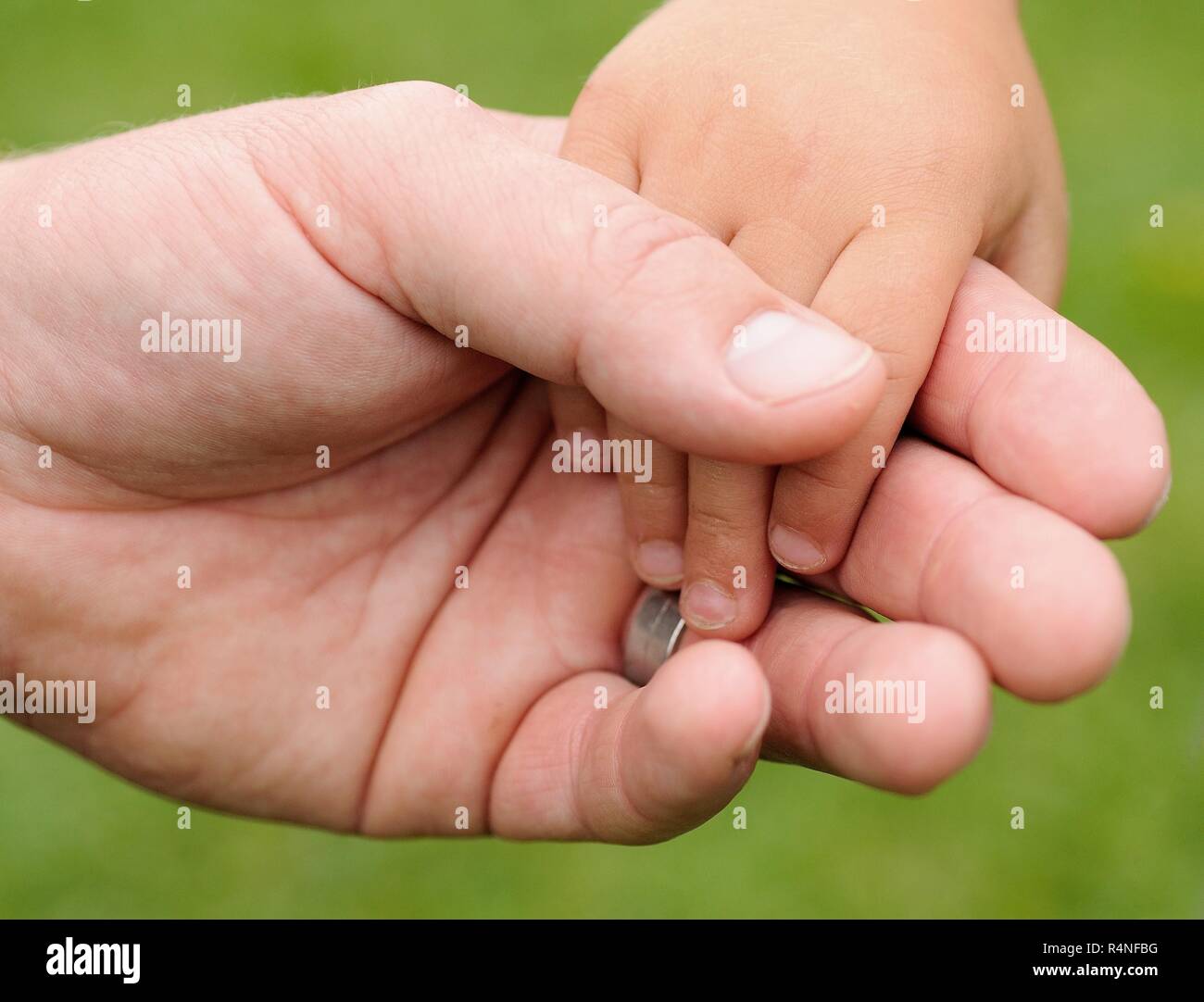Dad and child steering hi-res stock photography and images - Alamy