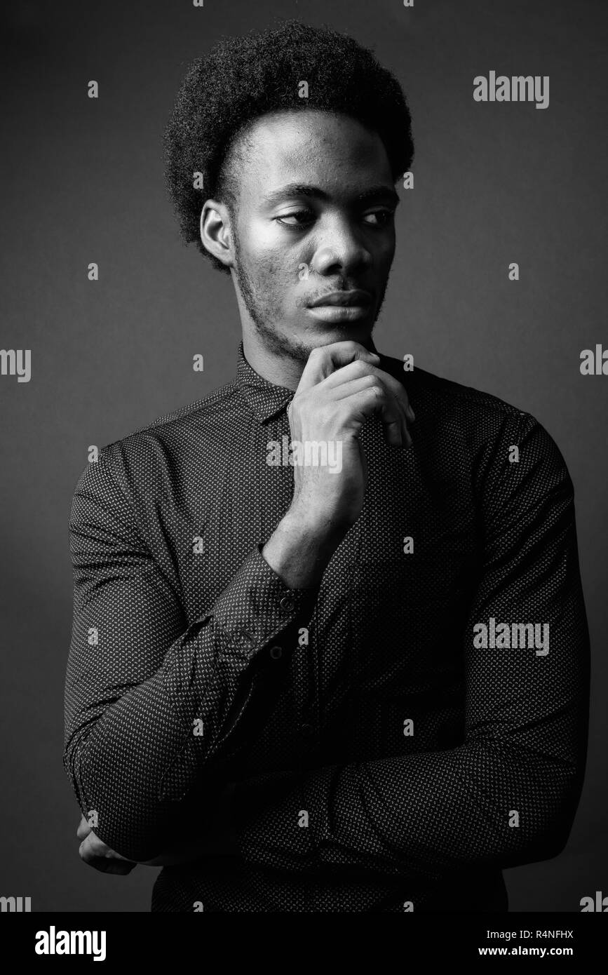 Black and white portrait of handsome African man thinking Stock Photo ...