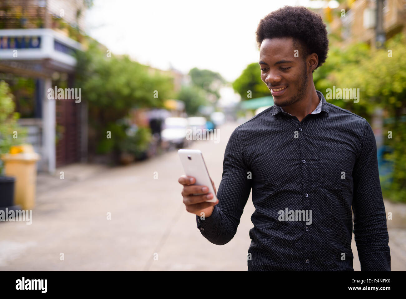 Business man mobile phone street hi-res stock photography and images ...