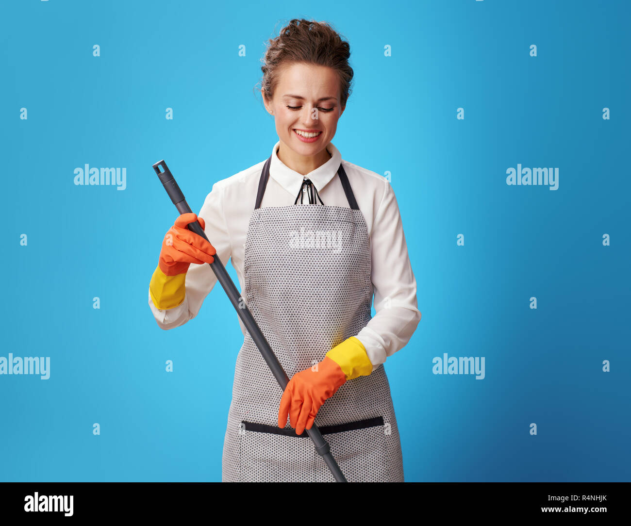 Cleaning lady mop apron hi-res stock photography and images - Alamy