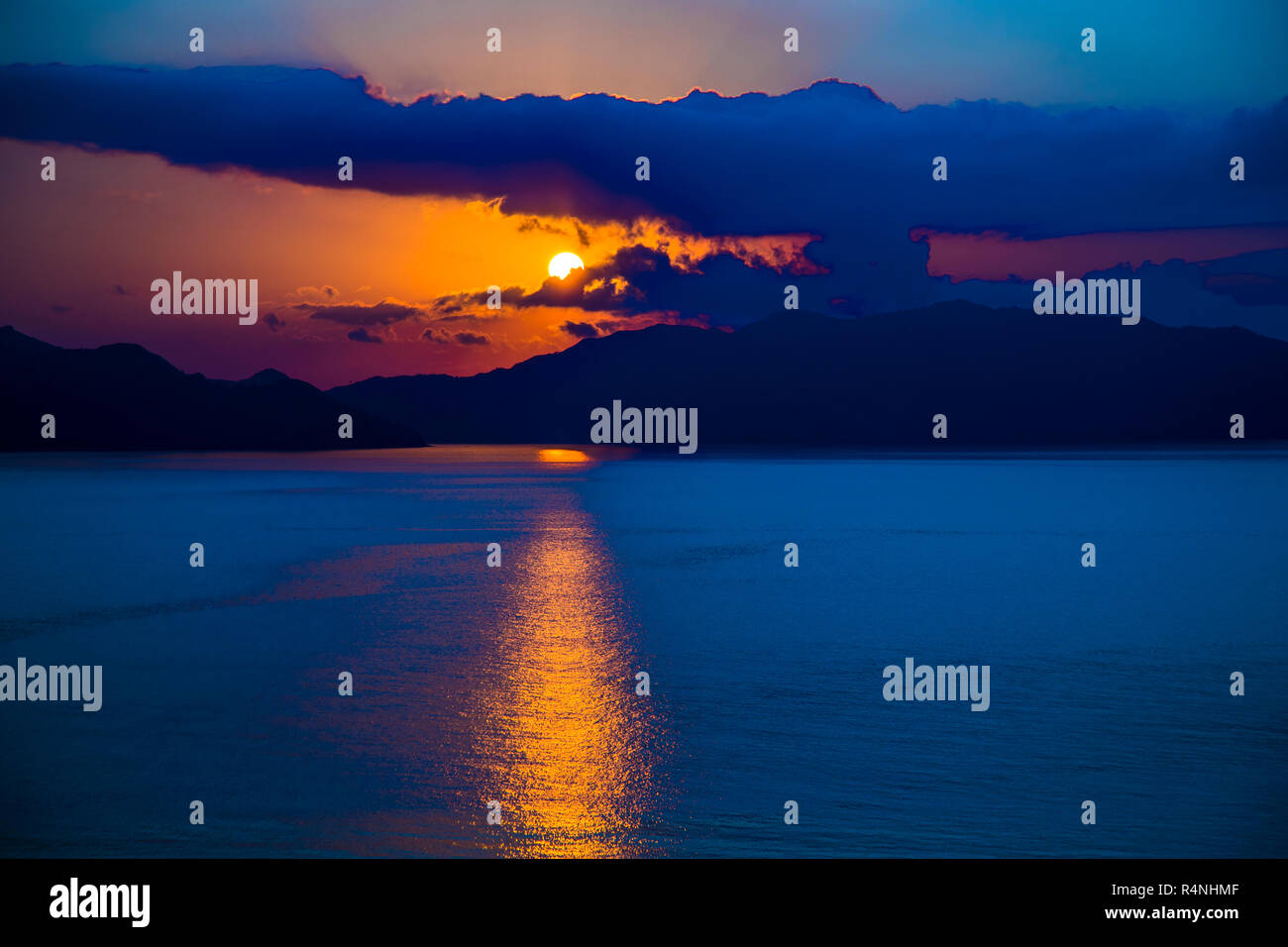 Sunset from the same viewpoint on Komodo Island, Indonesia (sequence of ...