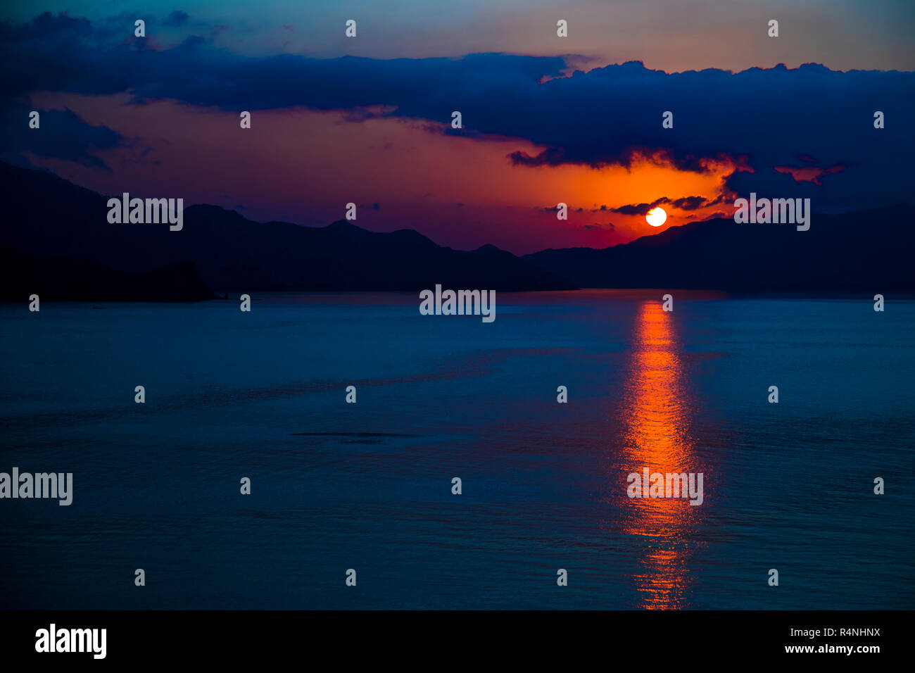 Sunset from the same viewpoint on Komodo Island, Indonesia (sequence of ...