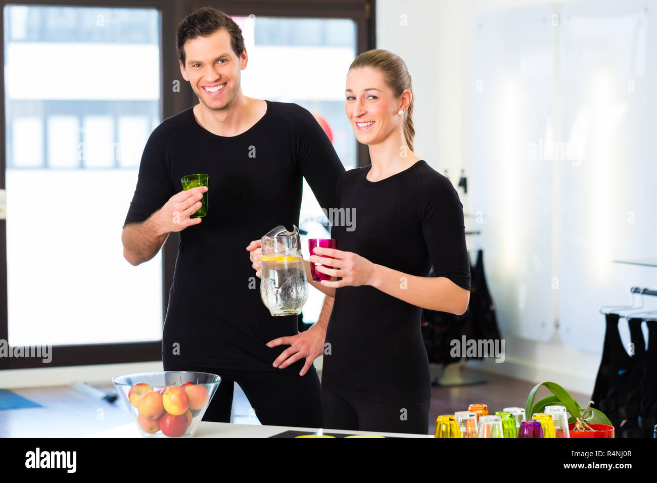 Woman gym having break drinking hi-res stock photography and images - Alamy