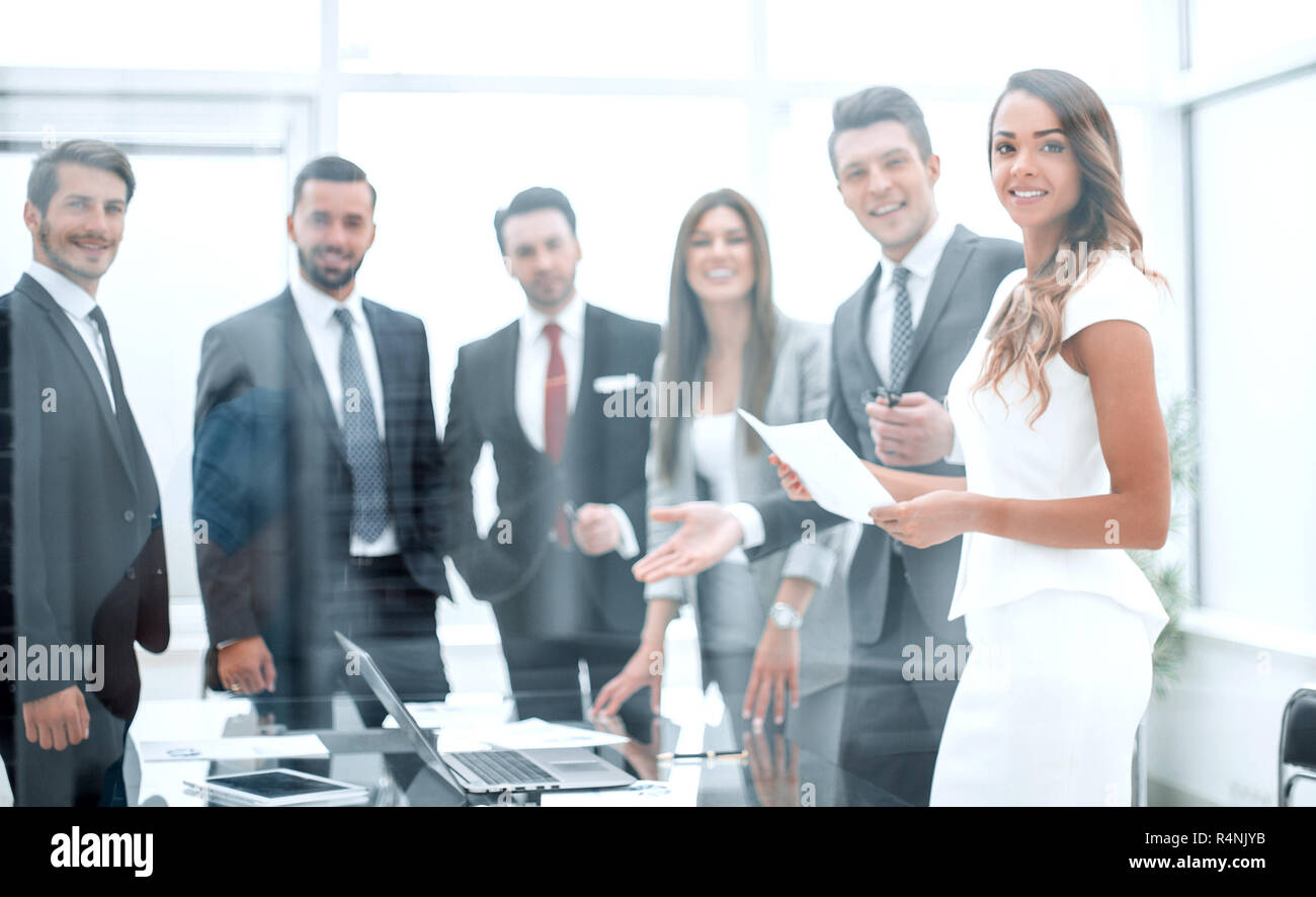 professional business team standing in the office Stock Photo - Alamy