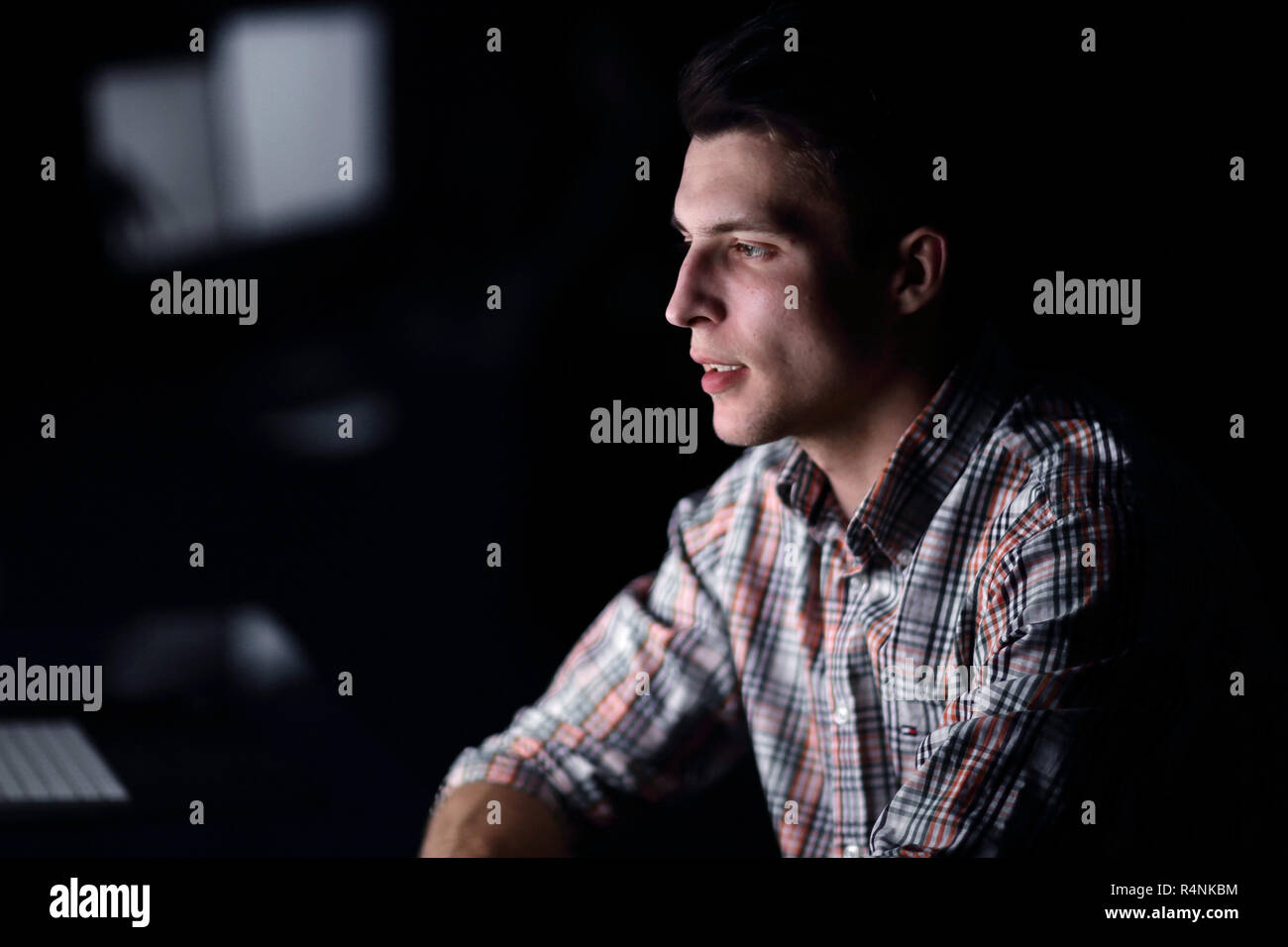 Tired employee working late Stock Photo - Alamy