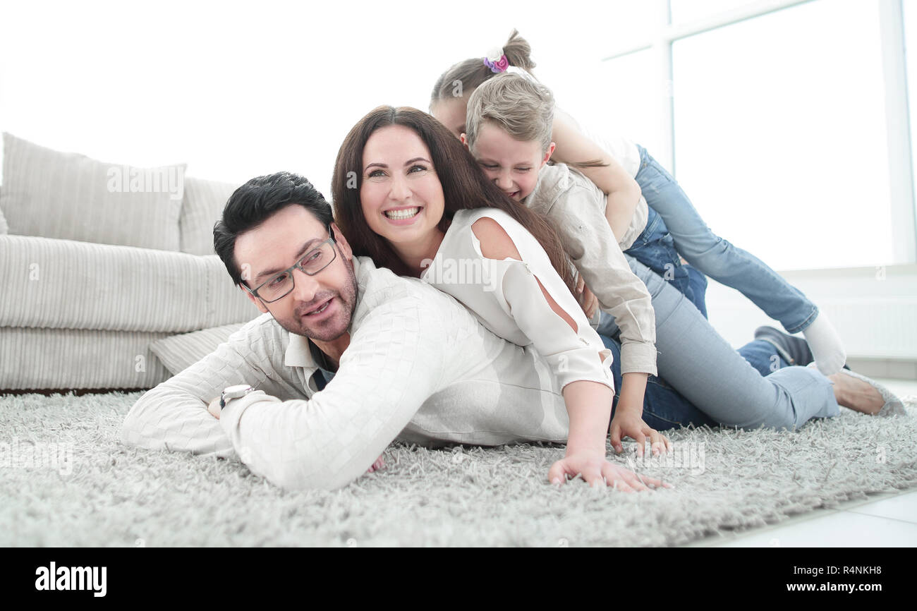 Happy family at home spending time togethe Stock Photo - Alamy