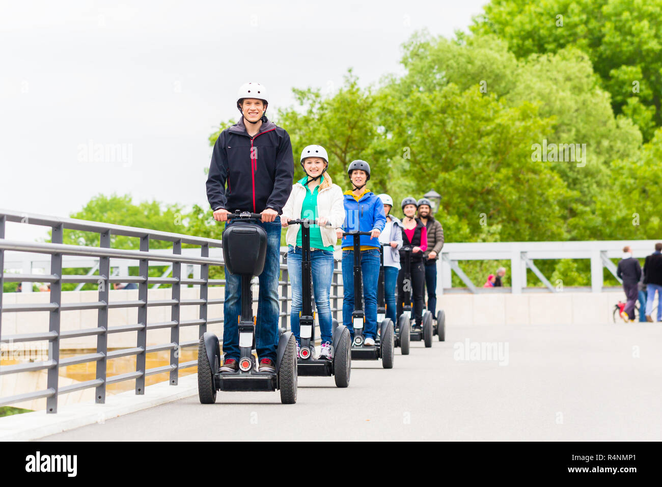 Tourist group driving Segway at sightseeing tour Stock Photo - Alamy