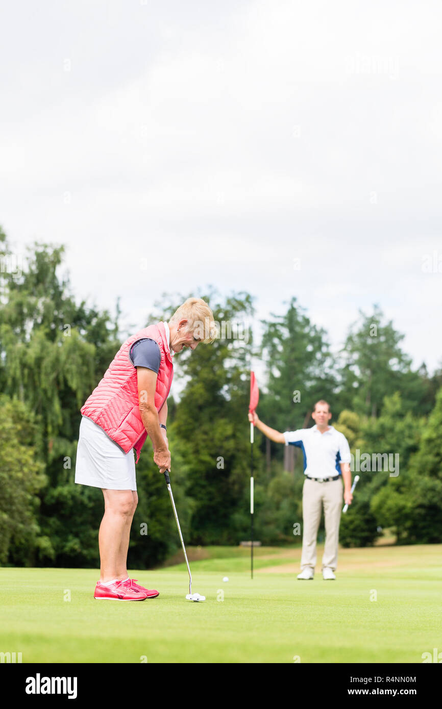 Older Woman Playing Golf High Resolution Stock Photography and Images ...