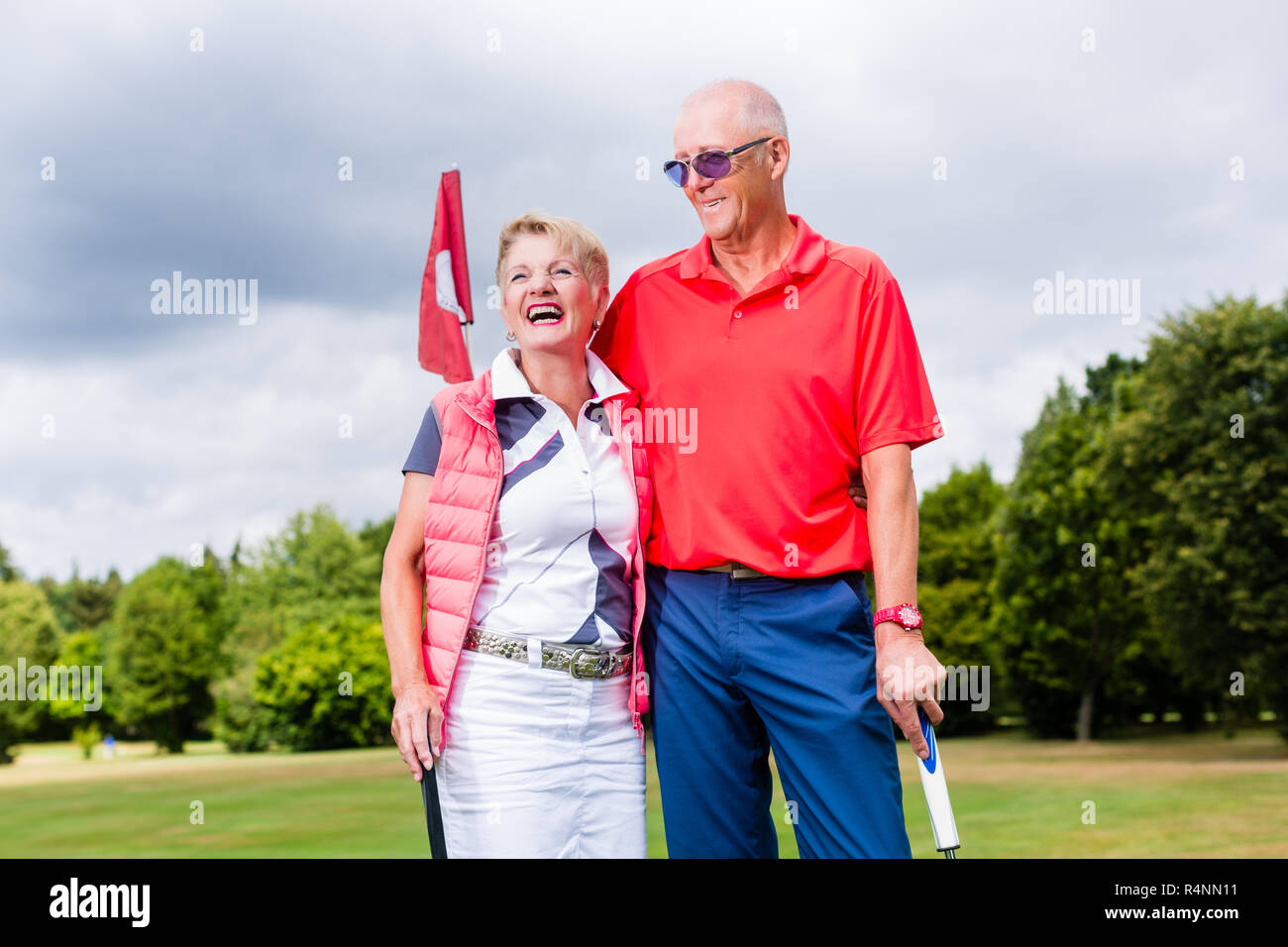 Older woman playing golf hi-res stock photography and images - Alamy