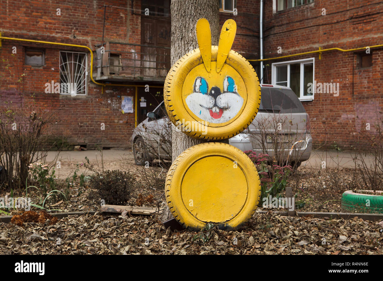 Yellow hare made from waste tyres on the child's playground in Ivanovo ...