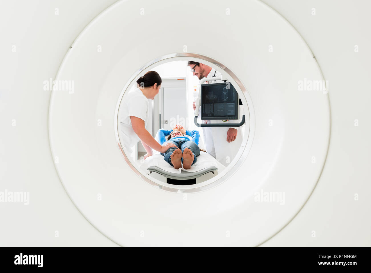 Doctor, nurse, and patient at CT scan Stock Photo - Alamy