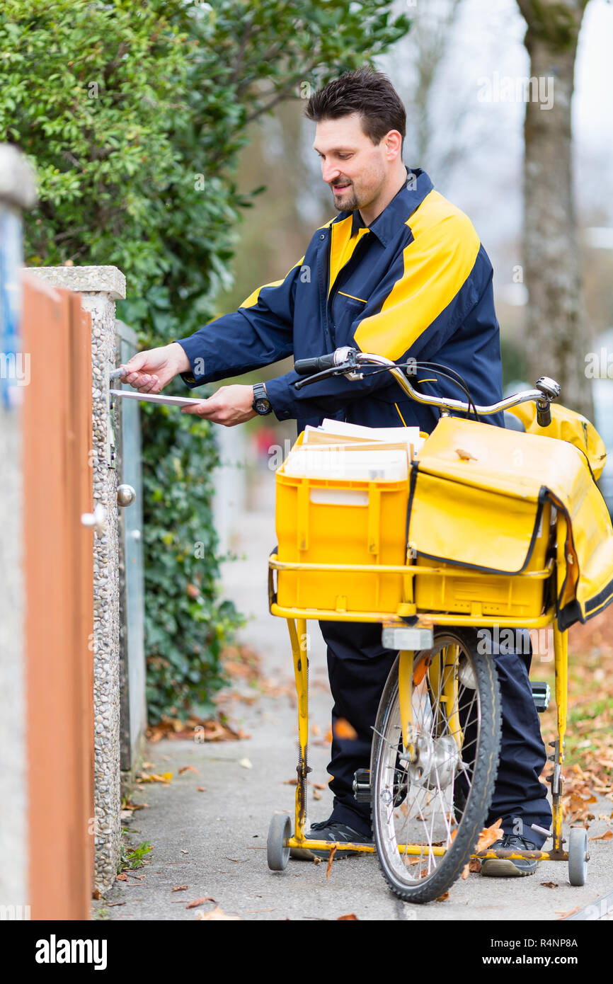 Postman Delivering Letters High Resolution Stock Photography and Images ...