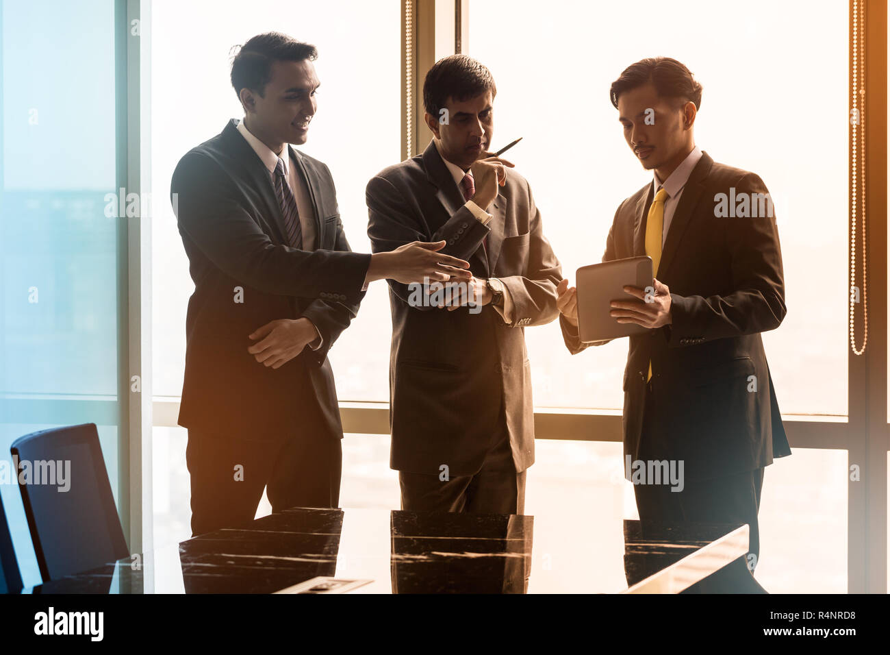 Asian Business people having conversation in conference room Stock ...