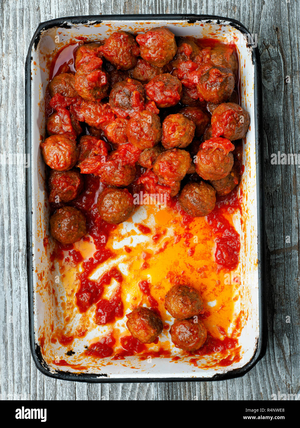 rustic italian meatball in tomato sauce Stock Photo - Alamy