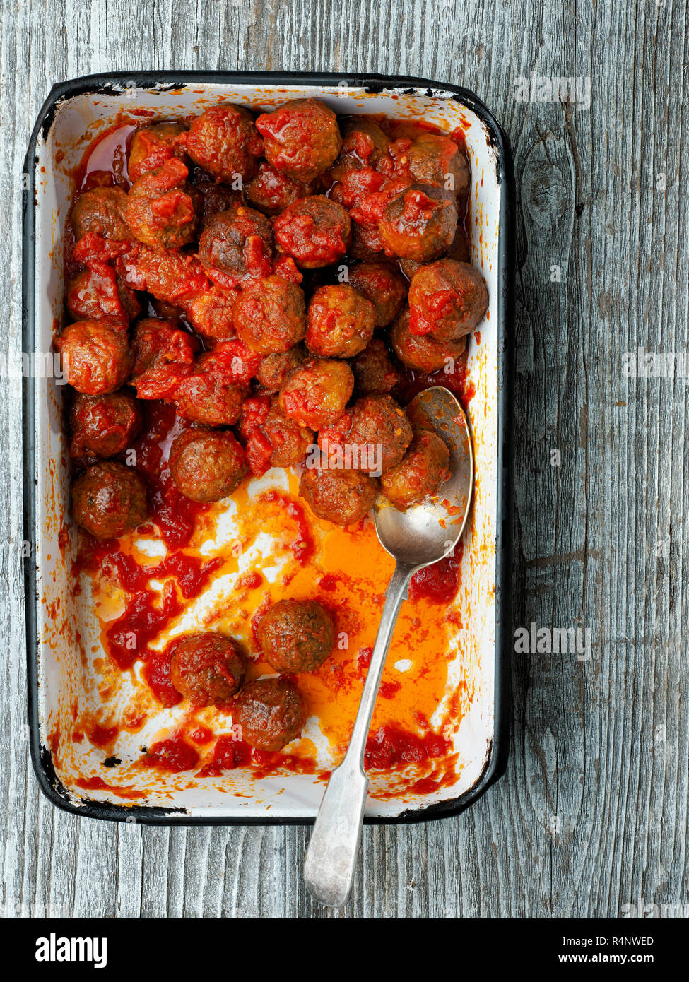 rustic italian meatball in tomato sauce Stock Photo - Alamy