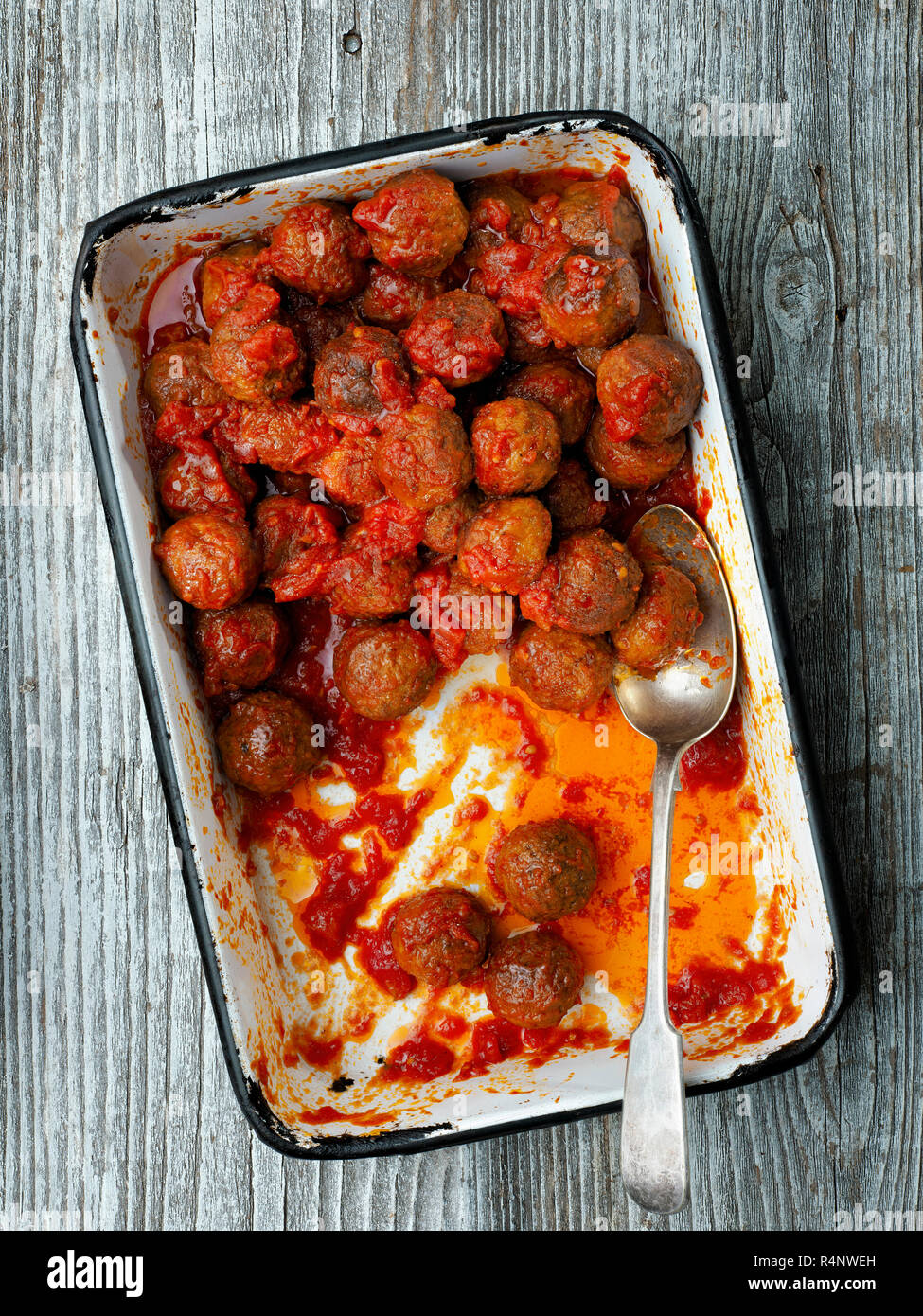 rustic italian meatball in tomato sauce Stock Photo - Alamy