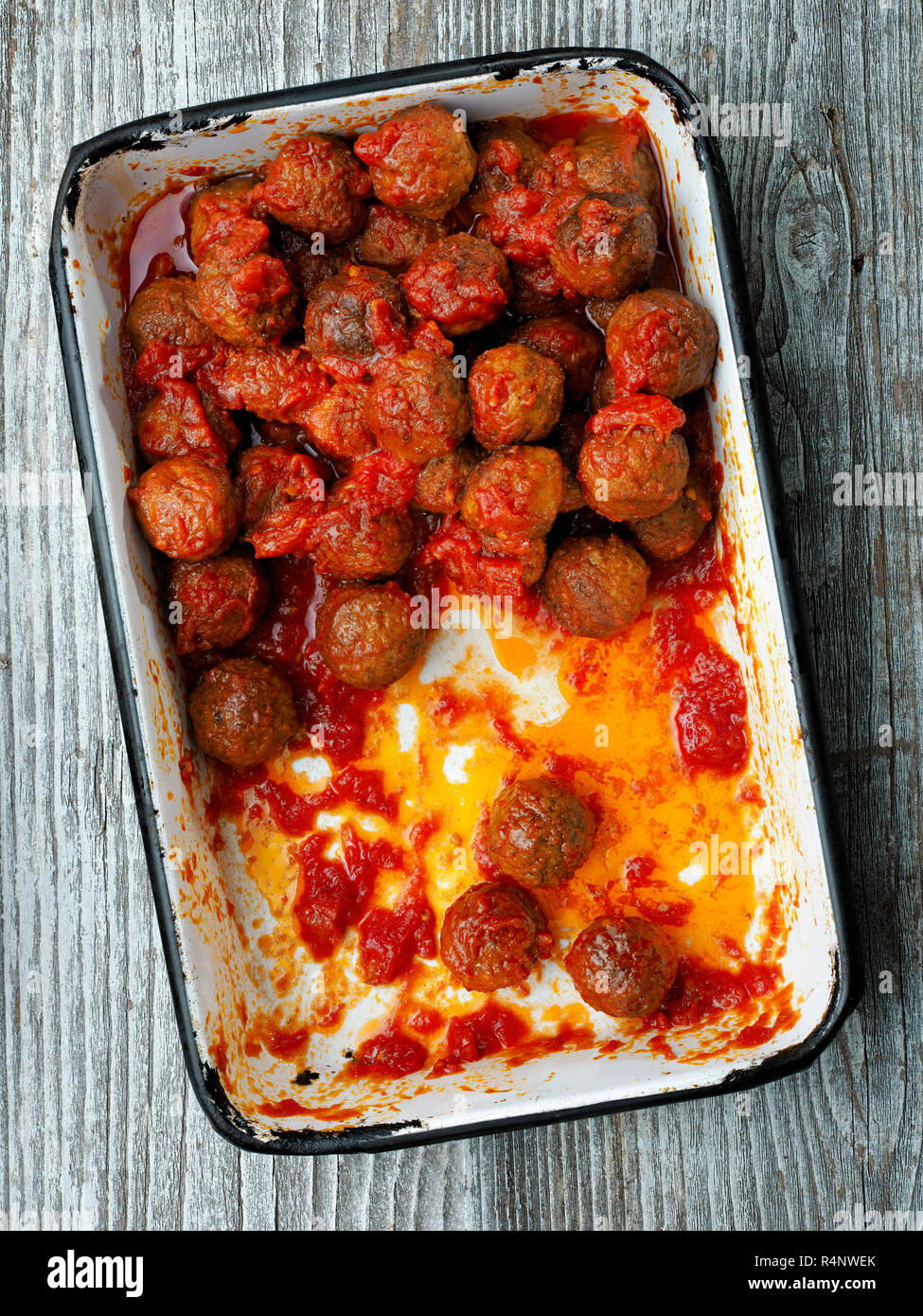 rustic italian meatball in tomato sauce Stock Photo - Alamy