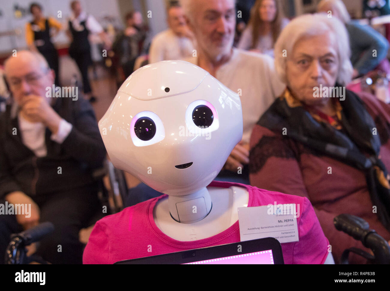 Frankfurt, Germany. 28th Nov 2018. The humanoid robot "Peppa" stands in ...