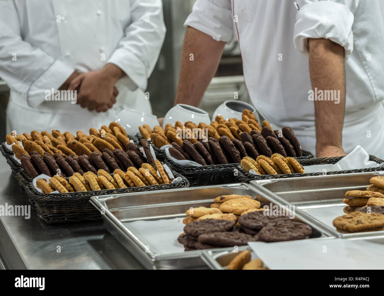 Cookies being baked in commercial kitchen Stock Photo - Alamy