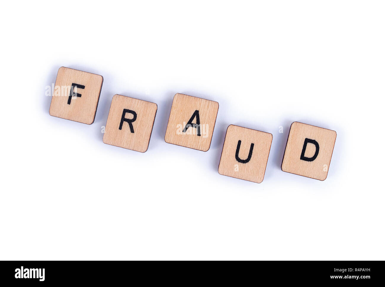 The word FRAUD, spelt with wooden tile letters Stock Photo - Alamy