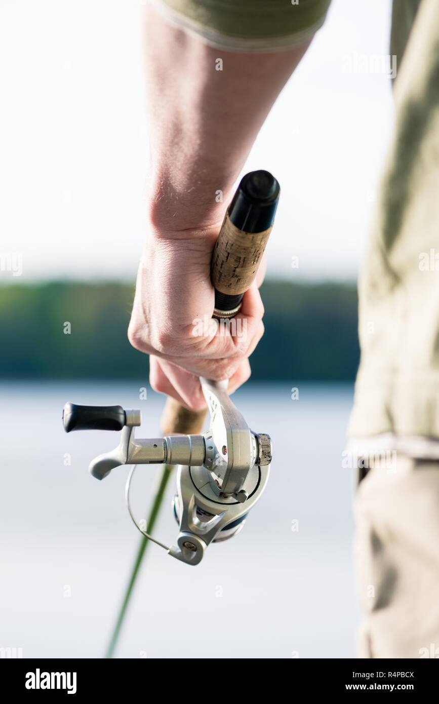 Rod in hand hi-res stock photography and images - Alamy