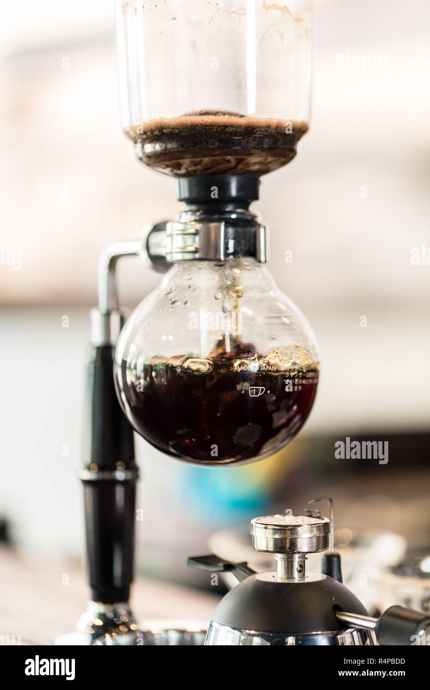 Drip coffee machine in super hip coffee shop Stock Photo - Alamy