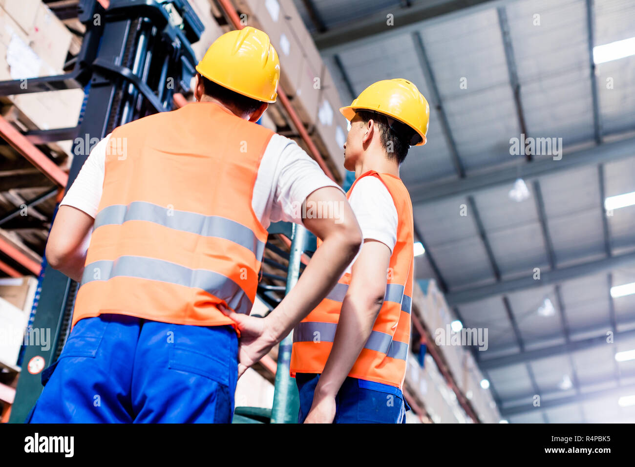 Worker team taking inventory in logistics warehouse Stock Photo - Alamy