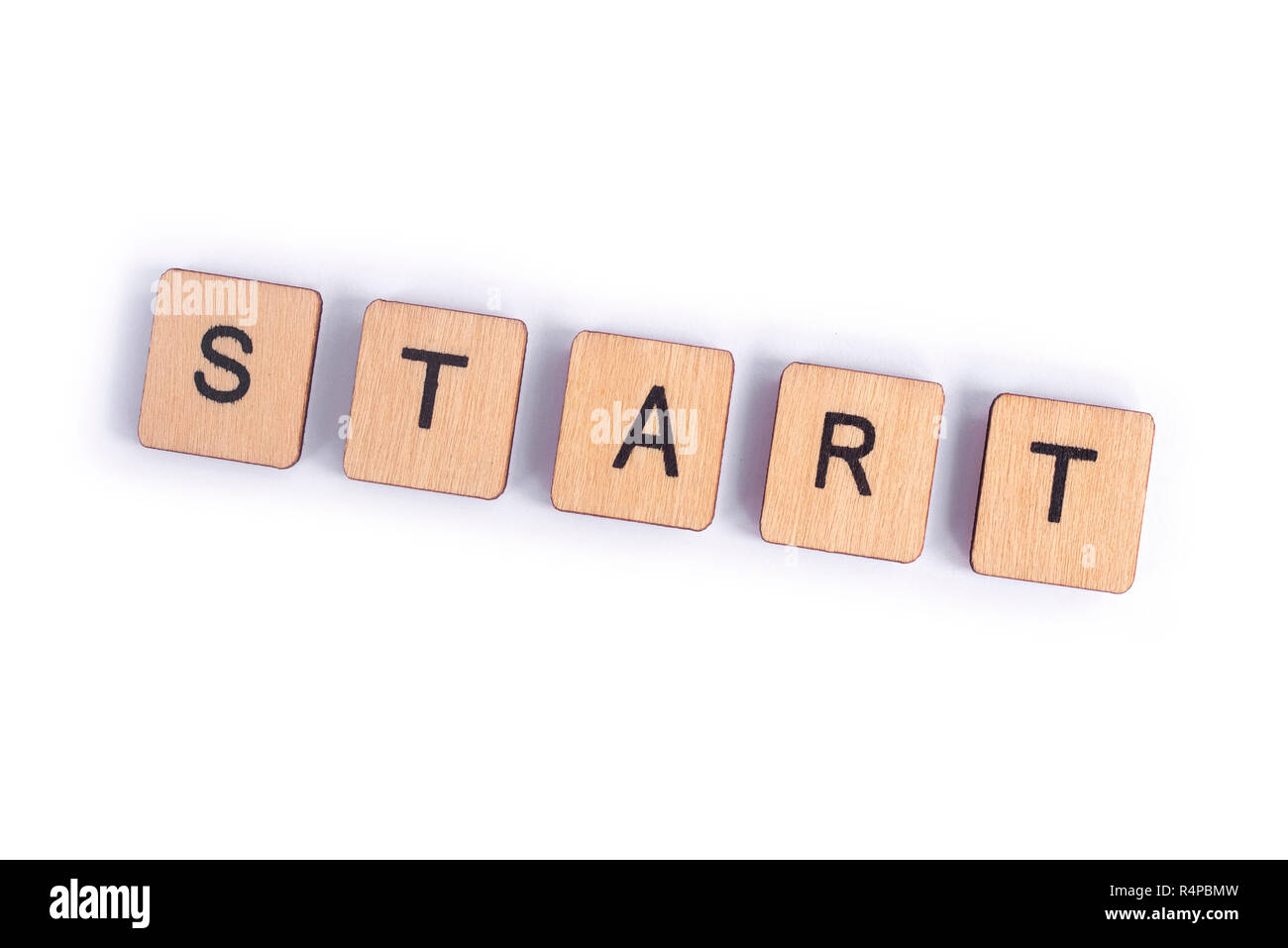 The word START, spelt with wooden letter tiles Stock Photo - Alamy