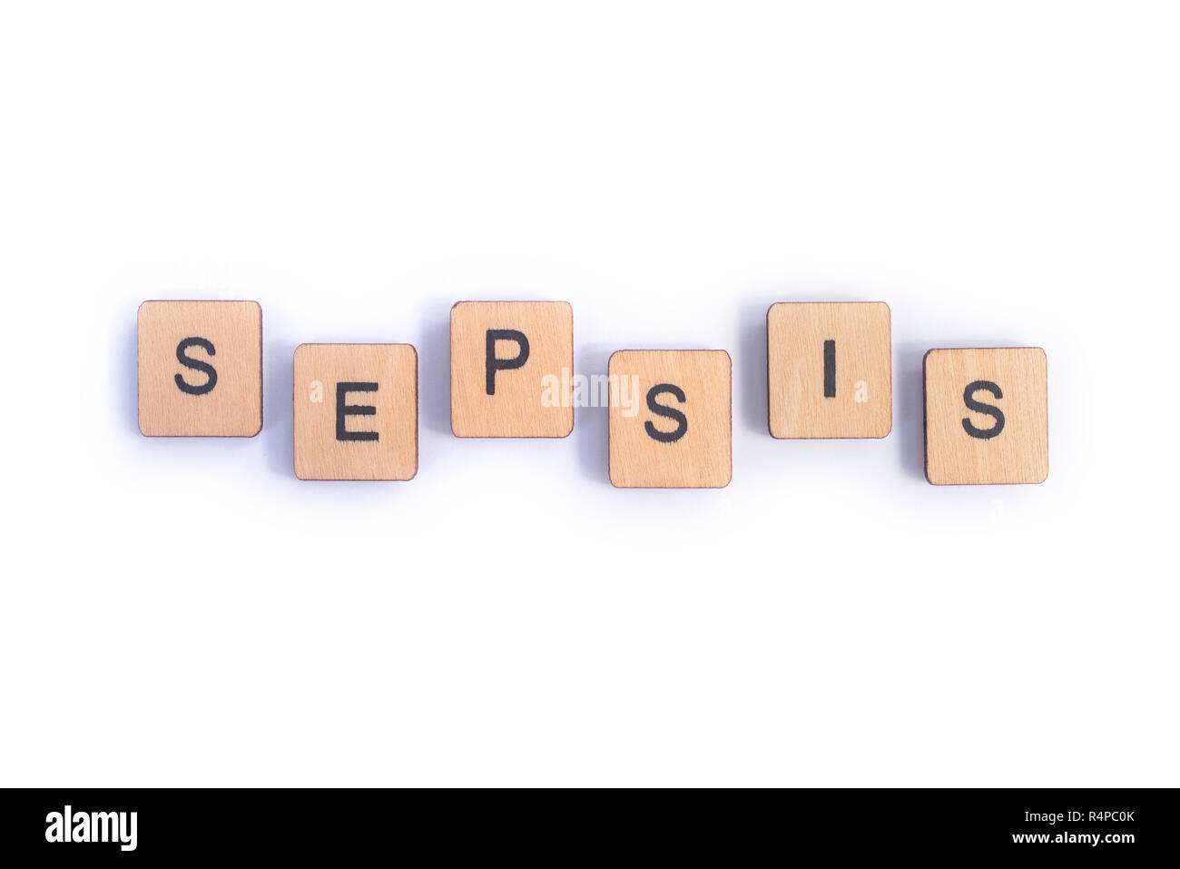 The word SEPSIS spelt with wooden letter tiles Stock Photo - Alamy