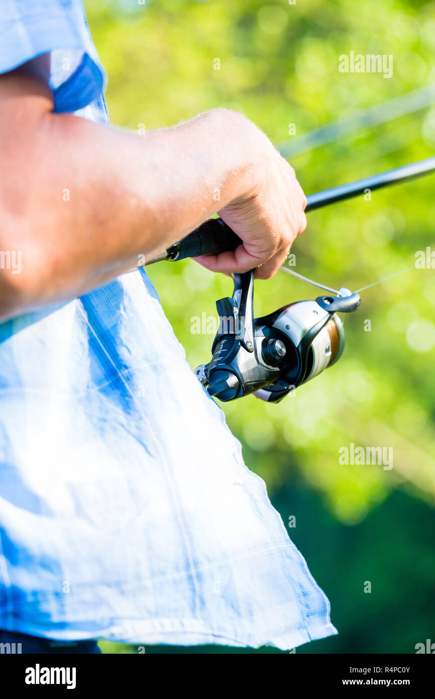 Hand reeling hi-res stock photography and images - Alamy