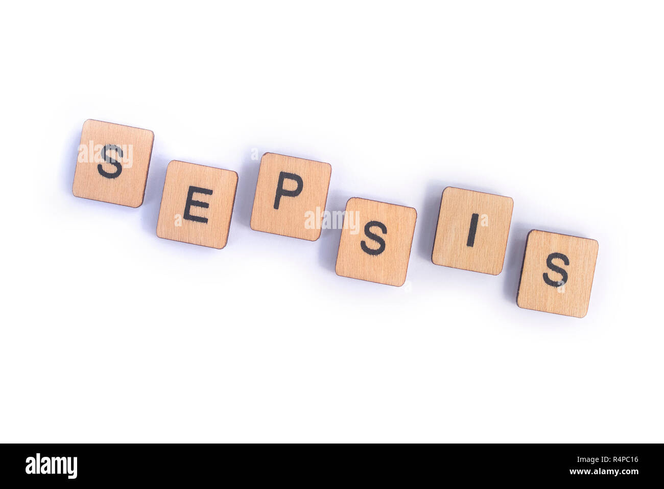 The word SEPSIS spelt with wooden letter tiles Stock Photo - Alamy