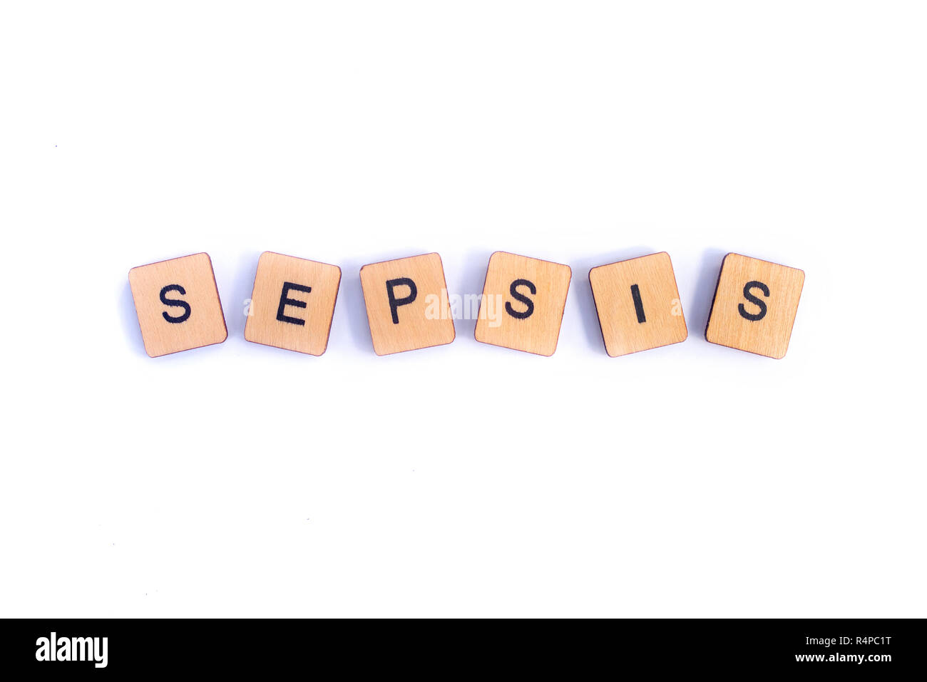 The word SEPSIS spelt with wooden letter tiles Stock Photo - Alamy