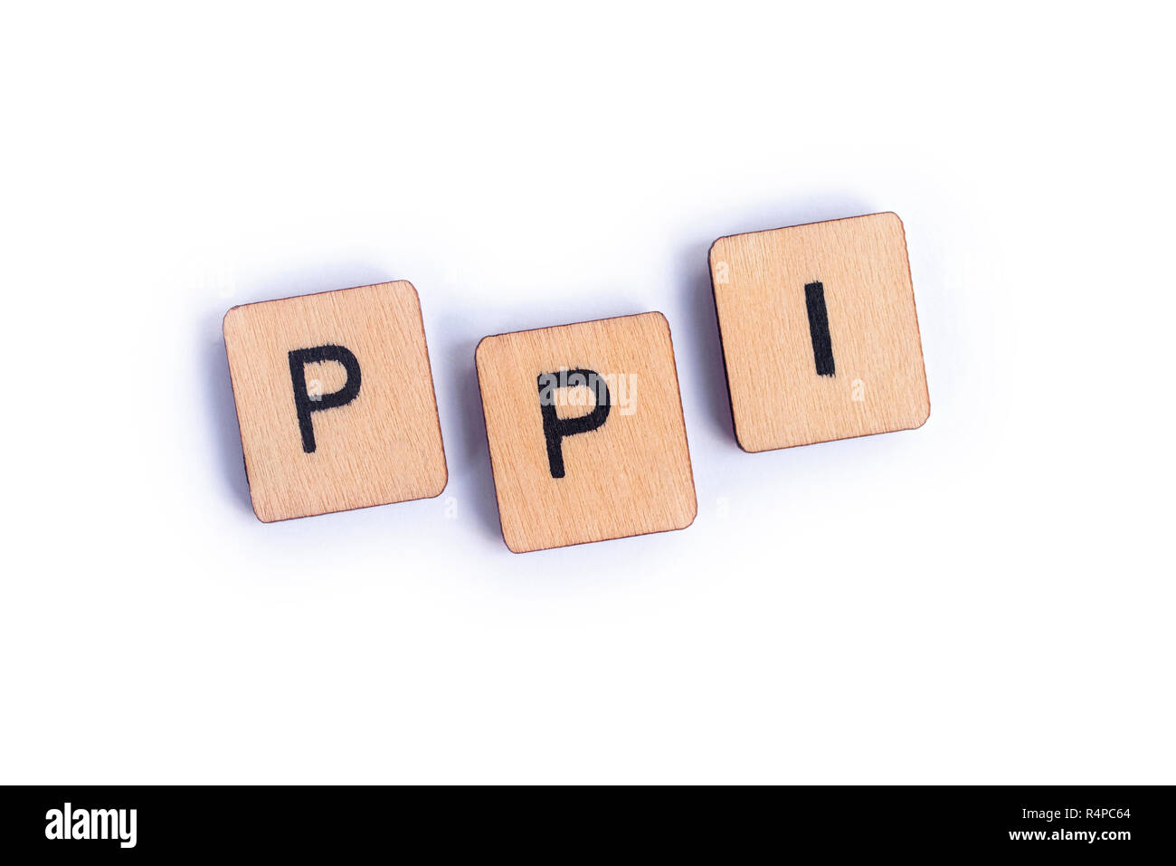 The abbreviation PPI - Payment Protection Insurance - spelt with wooden ...