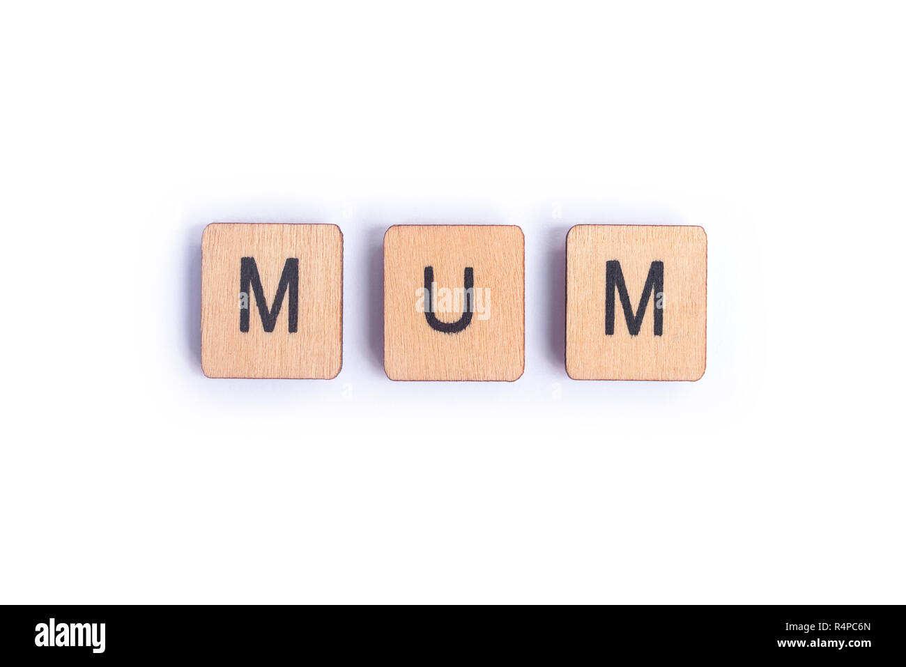 The word MUM spelt with wooden letter tiles Stock Photo - Alamy