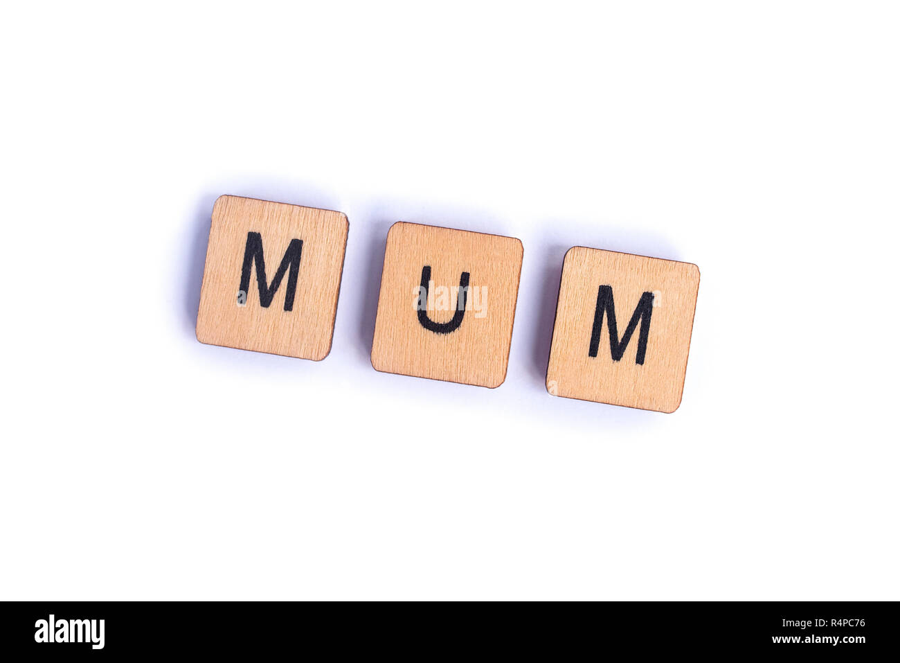 The word MUM spelt with wooden letter tiles Stock Photo - Alamy