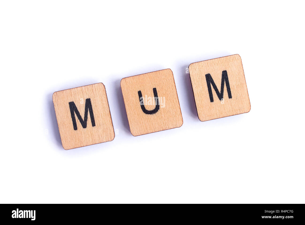 The word MUM spelt with wooden letter tiles Stock Photo - Alamy