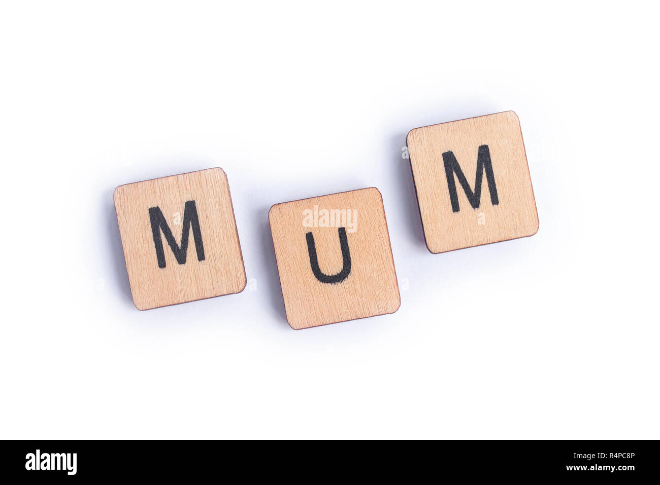 The word MUM spelt with wooden letter tiles Stock Photo - Alamy