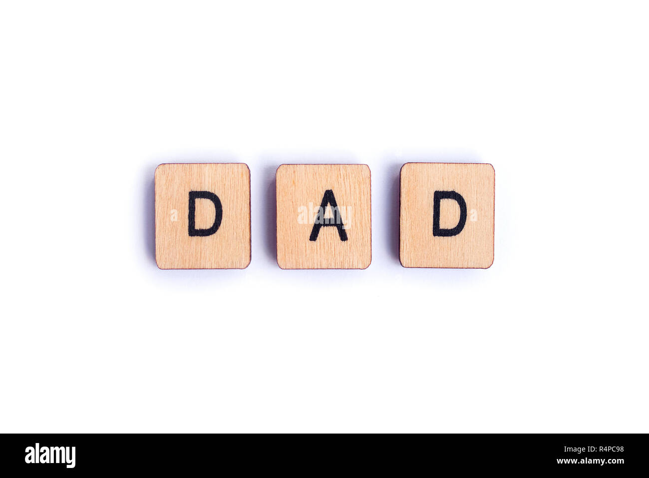 The word DAD spelt with wooden letter tiles Stock Photo - Alamy