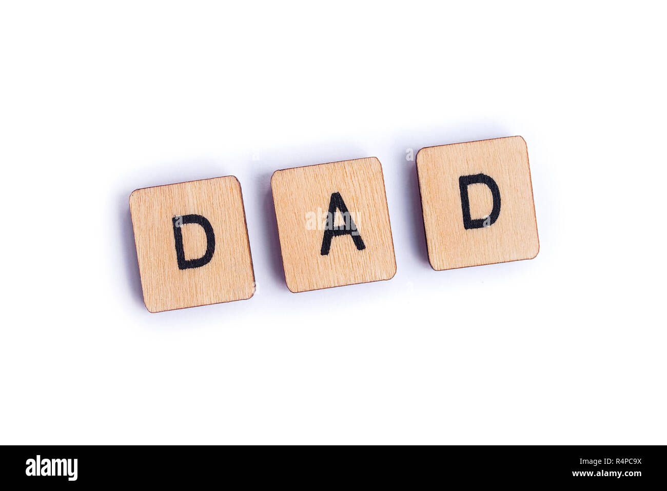 The word DAD spelt with wooden letter tiles Stock Photo - Alamy