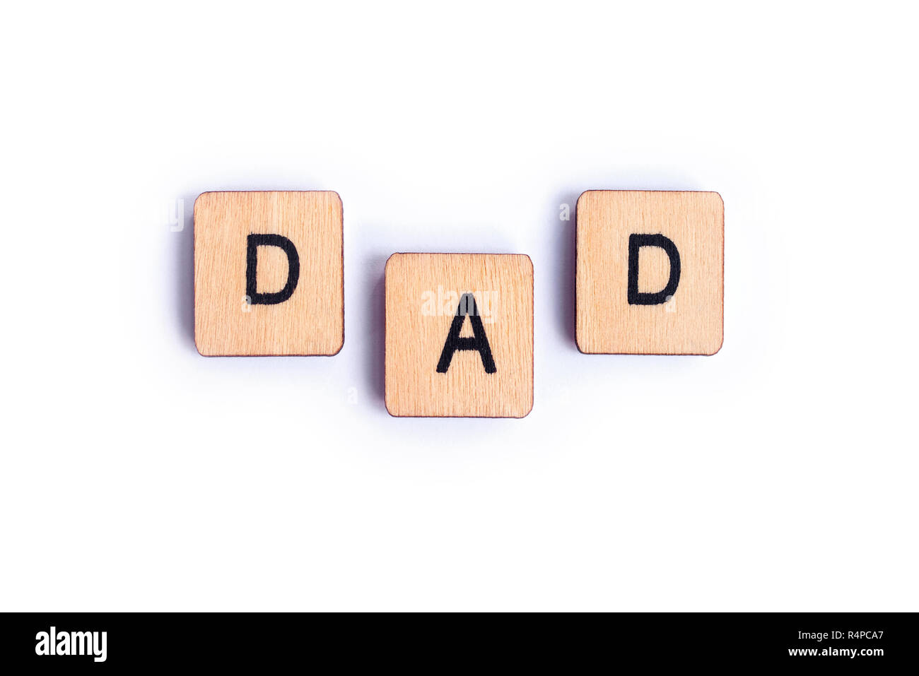 The word DAD spelt with wooden letter tiles Stock Photo - Alamy