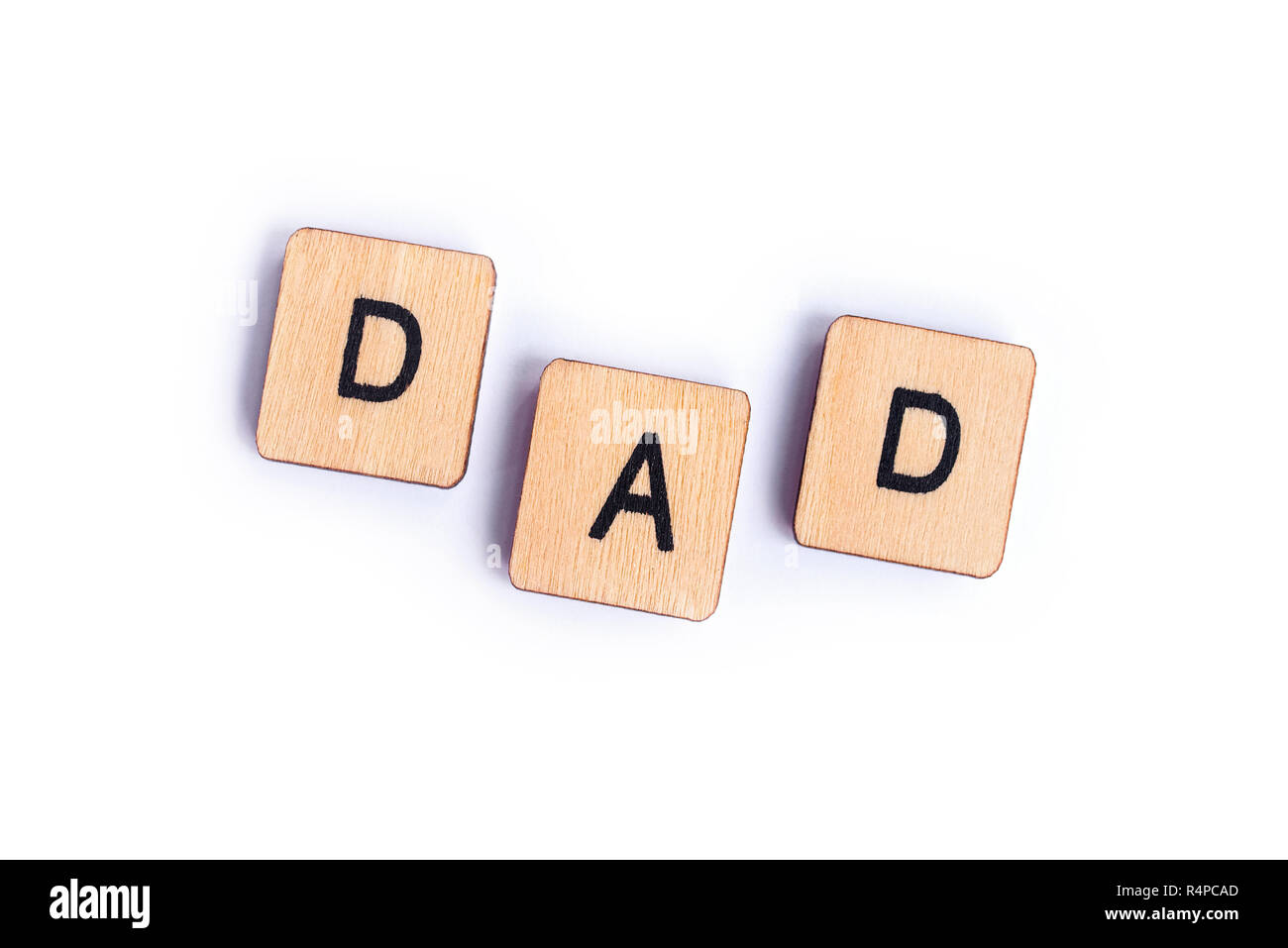 The word DAD spelt with wooden letter tiles Stock Photo - Alamy