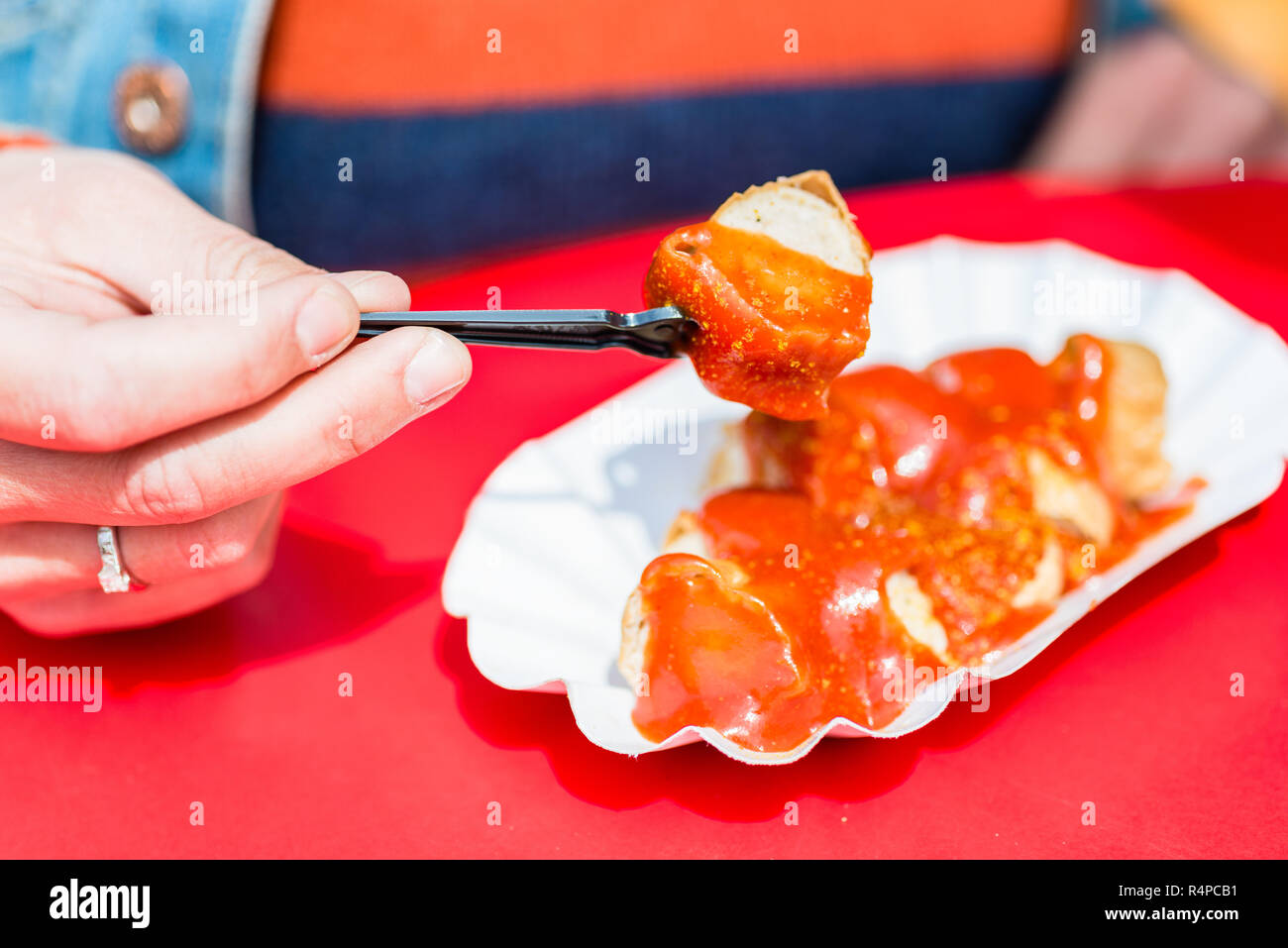 Eating Currywurst in Berlin Stock Photo - Alamy