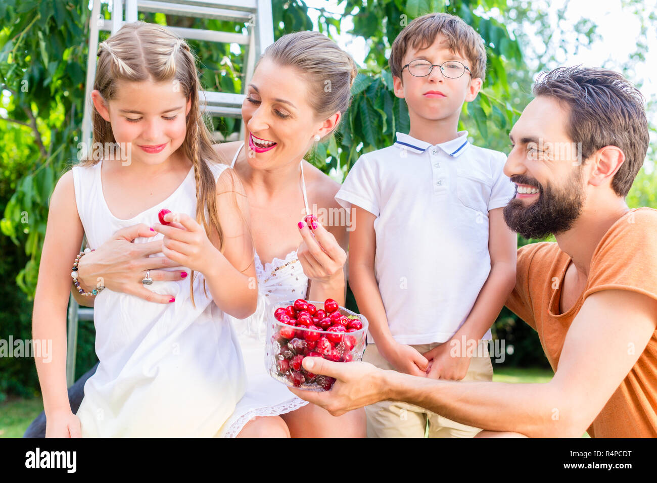 Male eating cherries hi-res stock photography and images - Alamy