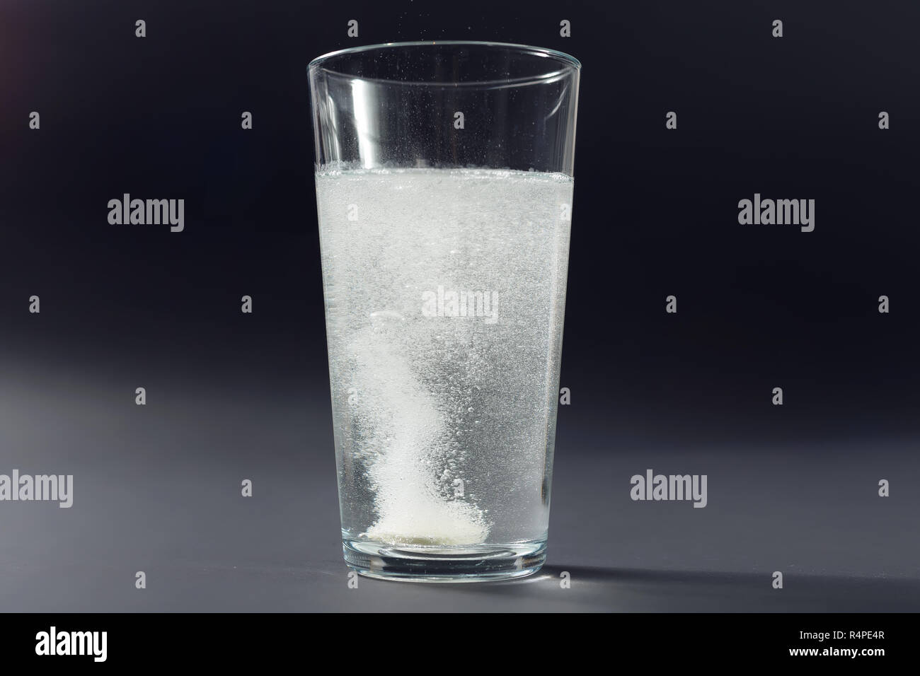 Effervescent tablet in water bubbles hi-res stock photography and ...
