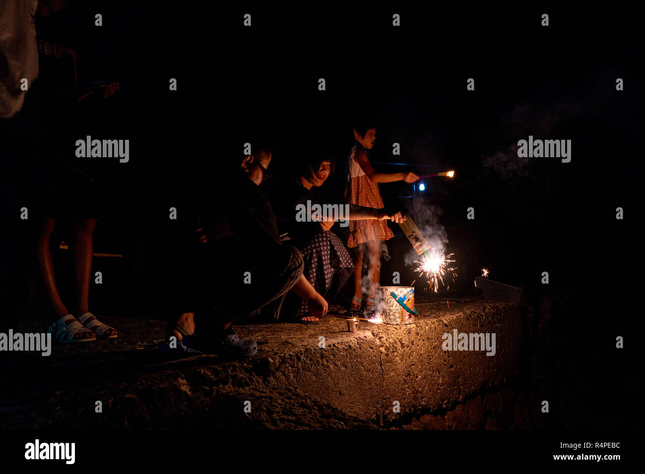 Kids Playing Fireworks Stock Photo - Alamy