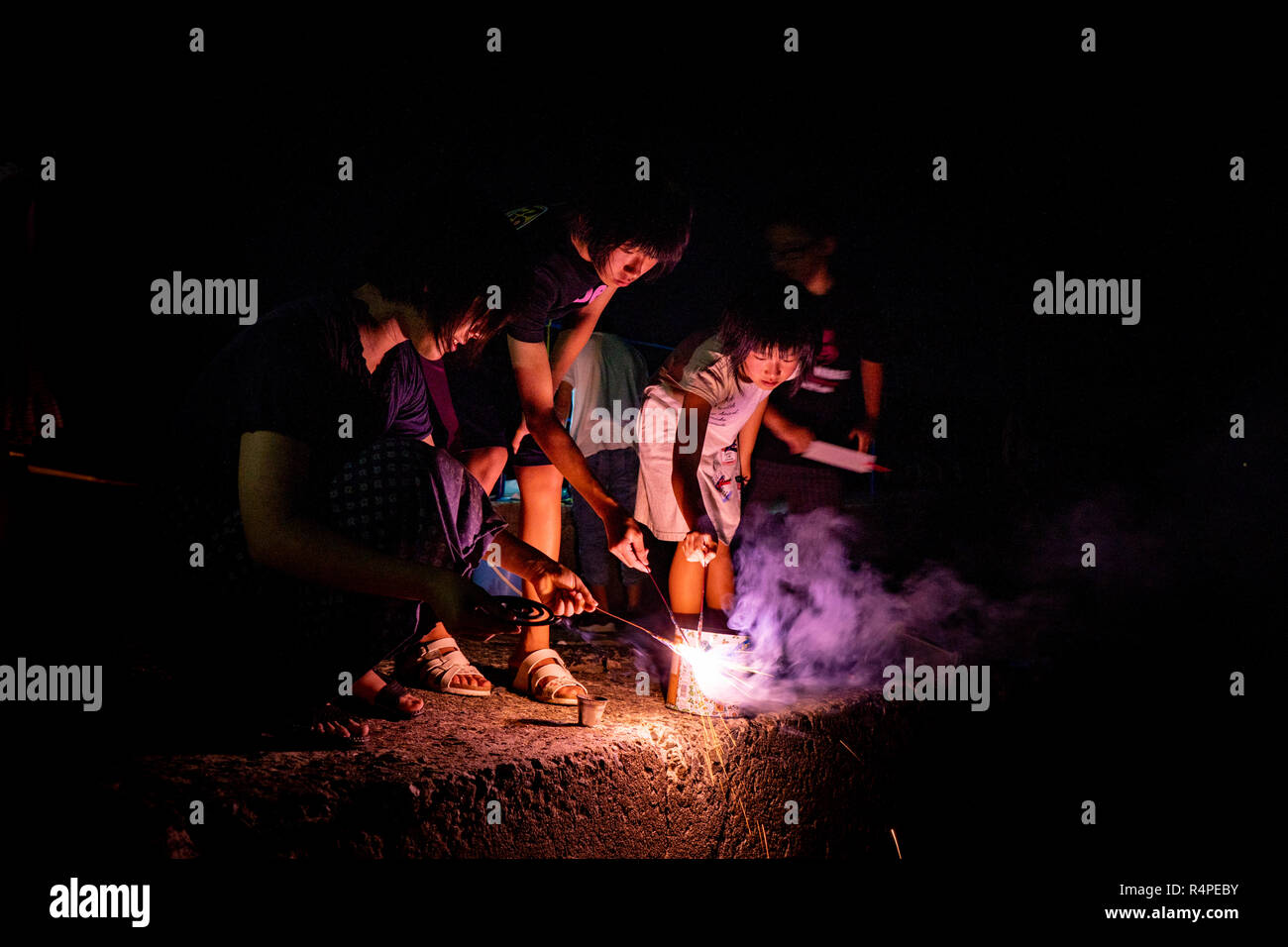 Kids Playing Fireworks Stock Photo - Alamy
