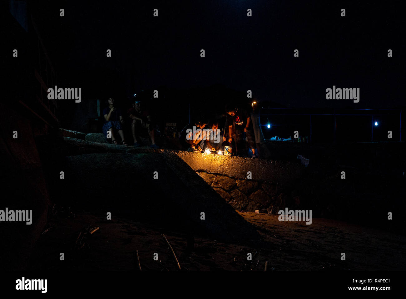 Kids Playing Fireworks Stock Photo - Alamy